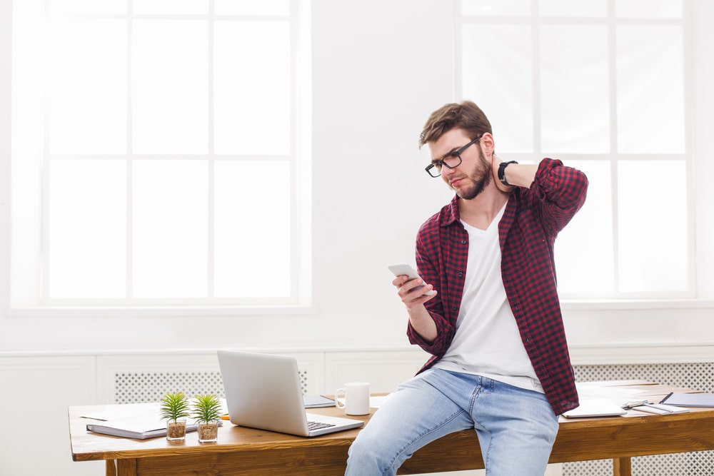 Is your mobile phone causing you neck pain? – Morley Physiotherapy Centre